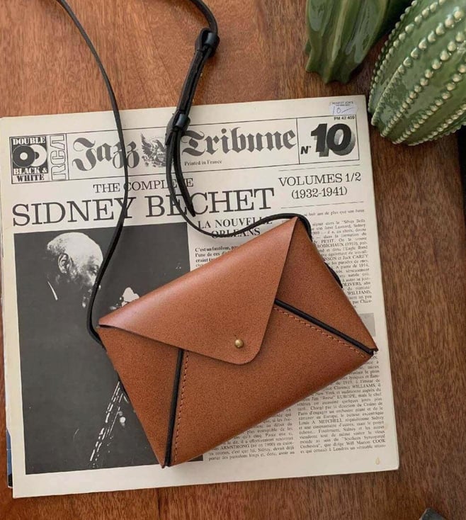 Buy Nappa Dori Tan Envelope Sling Bag Online @ Tata CLiQ Luxury