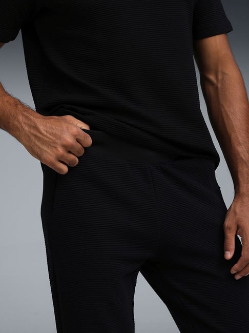 Puma Trousers & Chinos for Men in Black